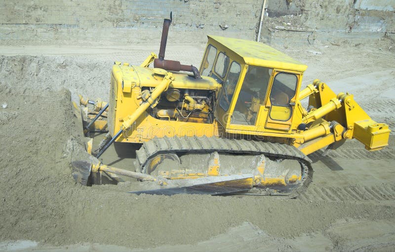 Bulldozer at work stock image. Image of industrial, site - 12966575