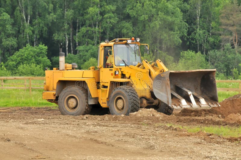 Bulldozer at work stock image. Image of excavator, machinery - 4132301
