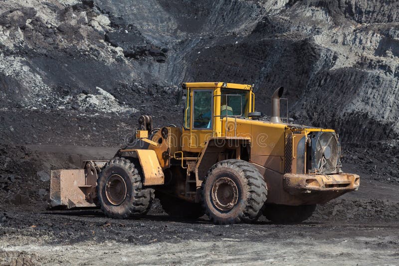 The Bulldozer Working in Coal Mines Stock Photo - Image of blue ...