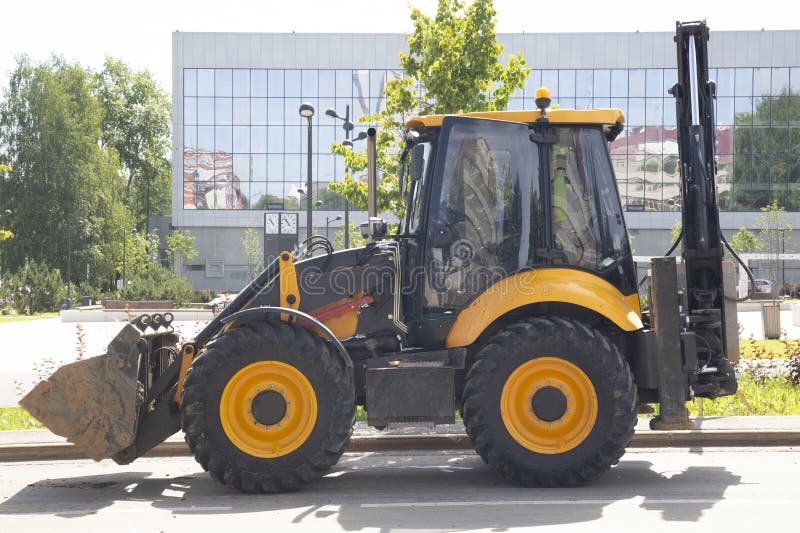 A Bulldozer. a Bulldozer is Working on Loading Sand Stock Photo - Image ...