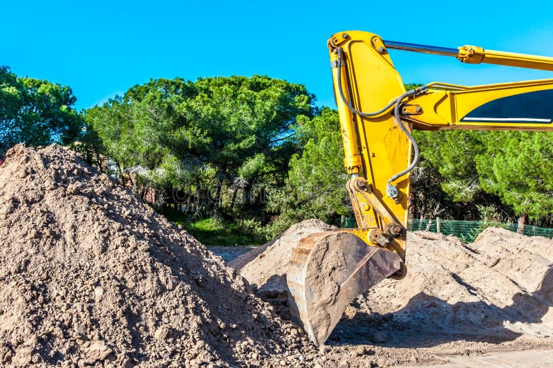 Bulldozer Working Near a Forest Stock Photo - Image of digger ...