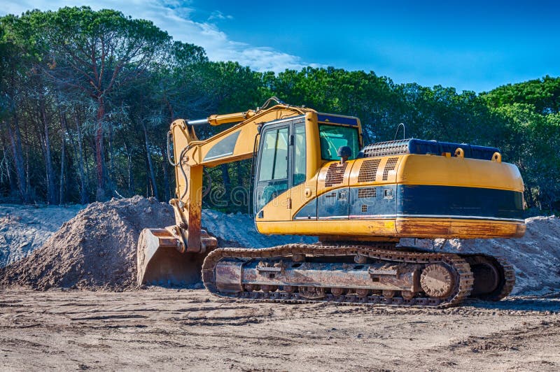 Bulldozer Working Near a Forest Stock Image - Image of heavy, ground ...