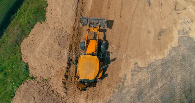 Bulldozer Works at a Construction Site. Working Process at a ...