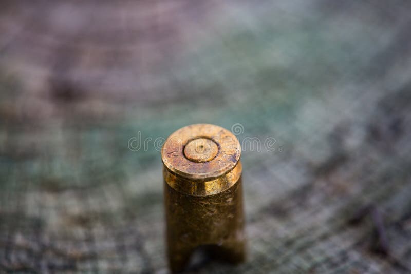 Bullet Casing Abandoned on the Ground Stock Image - Image of munition ...