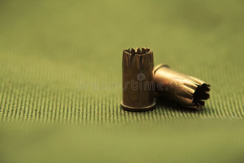 Bullet Casings on Textile stock image. Image of military - 55615427
