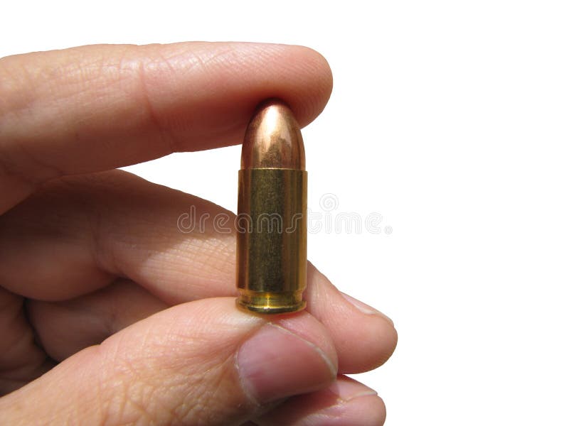 Bullet in fingers. stock image. Image of caliber, ammunition - 56101605