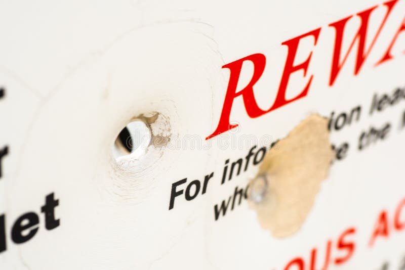 Bullet Hole in sign stock photo. Image of warning, close - 120920312