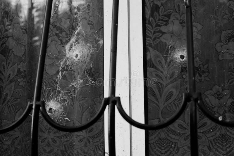 A Bullet Hole in the Window Stock Image - Image of glass, terror: 68074903
