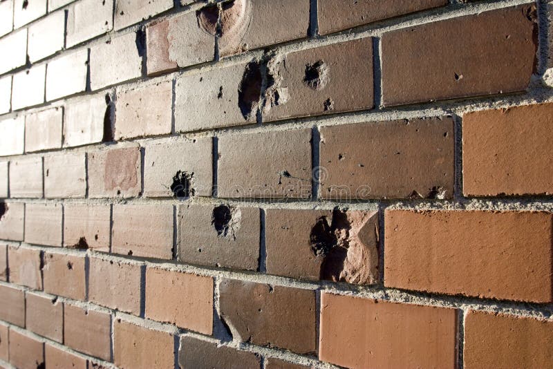 Bullet holes in brick wall stock image. Image of horizontal - 17877053