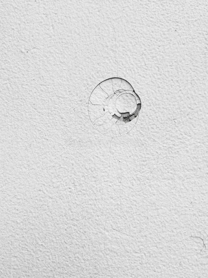 Bullet marks on the wall stock image. Image of grunge - 235672511