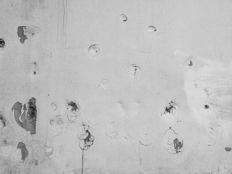 Bullet marks on the wall stock image. Image of grunge - 236106257