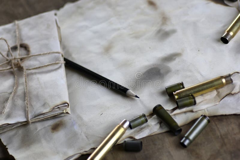 Bullet And Retro Paper On The Table Stock Photo - Image of diary, aged ...