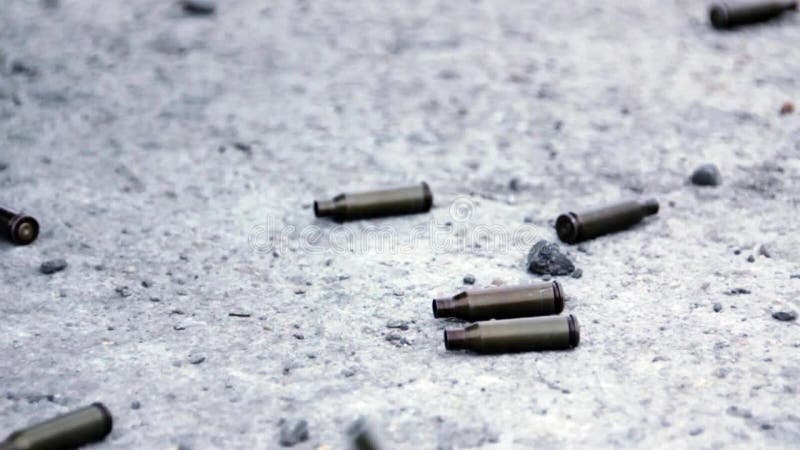 Bullet Shells Falling on the Ground Stock Video - Video of bullet ...