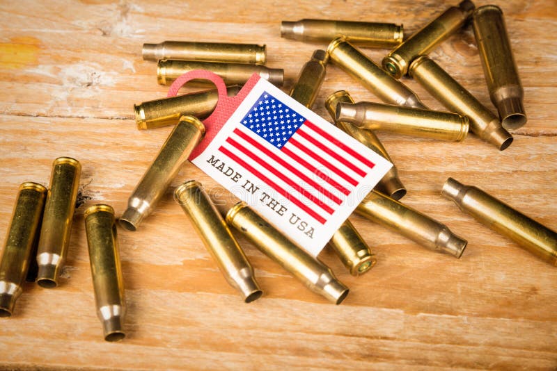 Bullet shells and US flag stock photo. Image of dangerous - 99259638