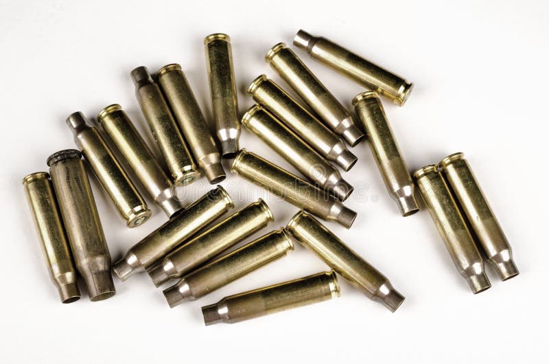 Bullet Shells from Heavy Machine Gun on the Table with Camouflage ...