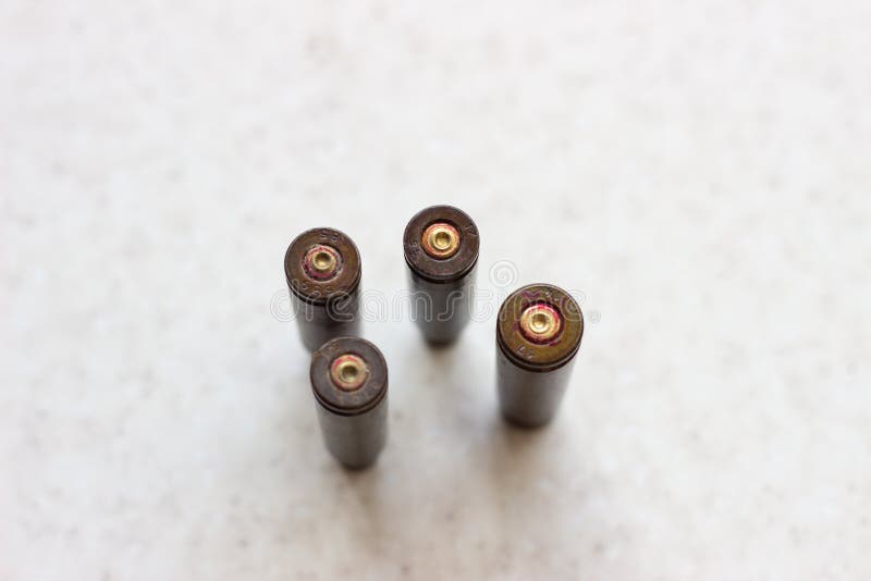 Bullet Shells on a White Surface. Shell Casings on a White Background ...