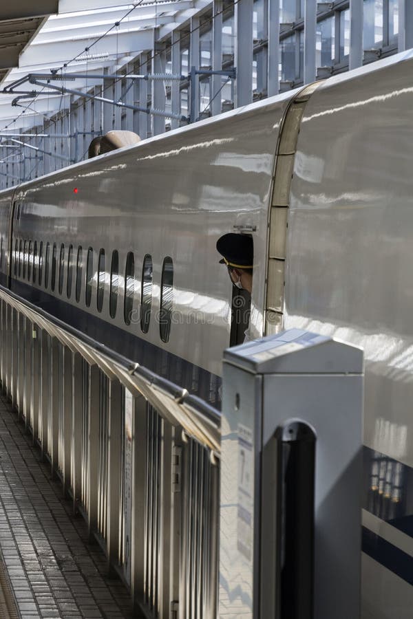 Bullet Train Conductor Peeking Out Window Stock Photos - Free & Royalty ...