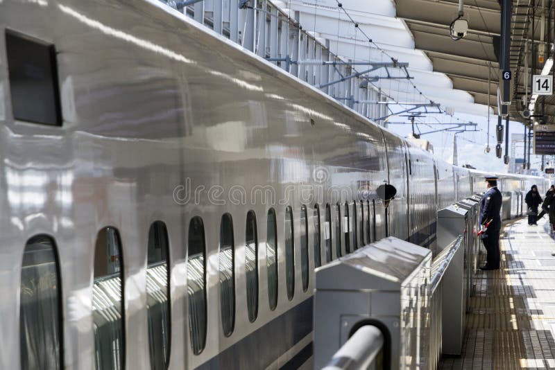 Bullet Train Conductor Peeking Out Window Stock Photos - Free & Royalty ...