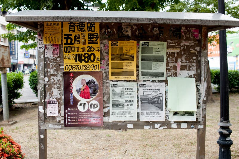 Bulletin Board on the Metal Fence with Colourful Messages on the Street ...