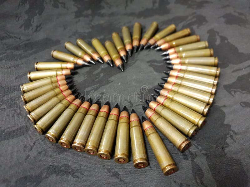 Bullets on the Black Camo in the Shape of a Heart Stock Photo - Image ...