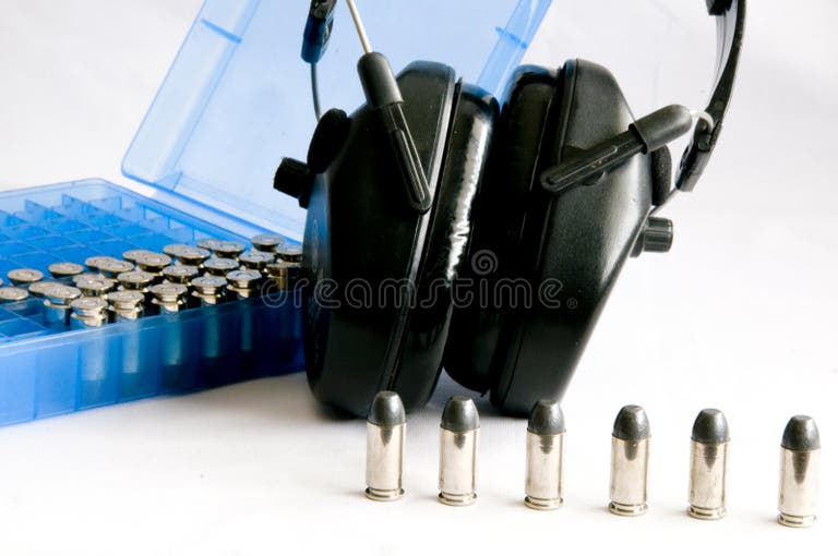 Bullets and ear protection stock image. Image of police - 8841787