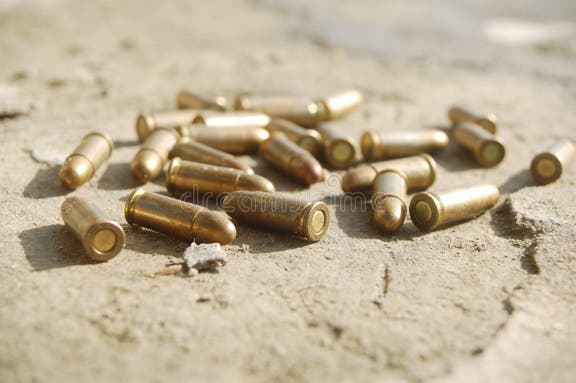 Bullets on the ground stock photo. Image of fighting - 13100520