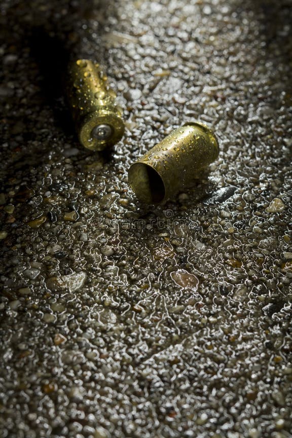 Bullets on the Ground on a Rainy Day Stock Photo - Image of assault ...
