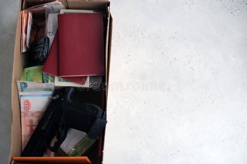 Bullets with Handgun in the Back of the Scene with Focus on the Bullet ...