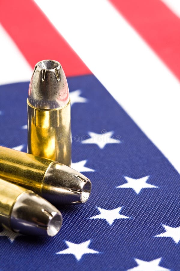 Gun and bullets on flag stock photo. Image of patriotic - 4992272