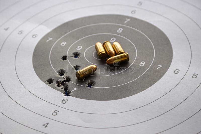 Bullets on Paper Target for Shooting Practice Stock Image - Image of ...