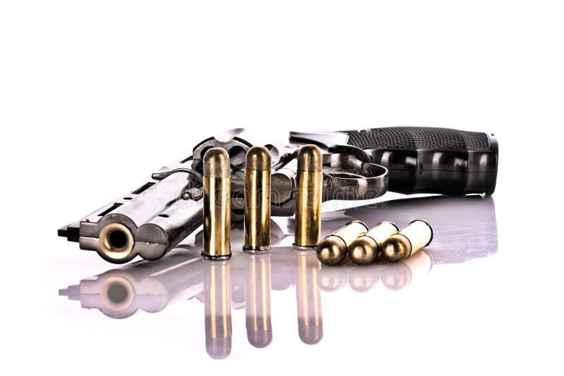 Bullets and revolver. stock photo. Image of armed, round - 13217376
