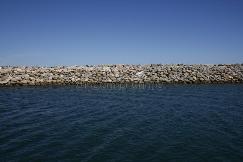 Bulwark made by stone stock photo. Image of ocean, pier - 26286274