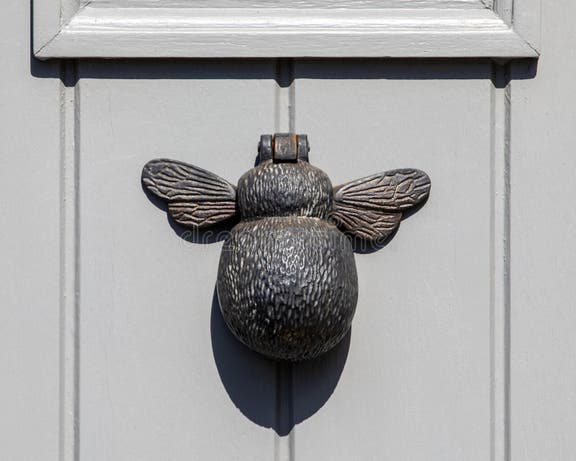 Bumble Bee Door Knocker stock photo. Image of doorway - 280187278