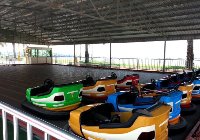 Bumper car racing in beach stock photo. Image of ride - 57661326