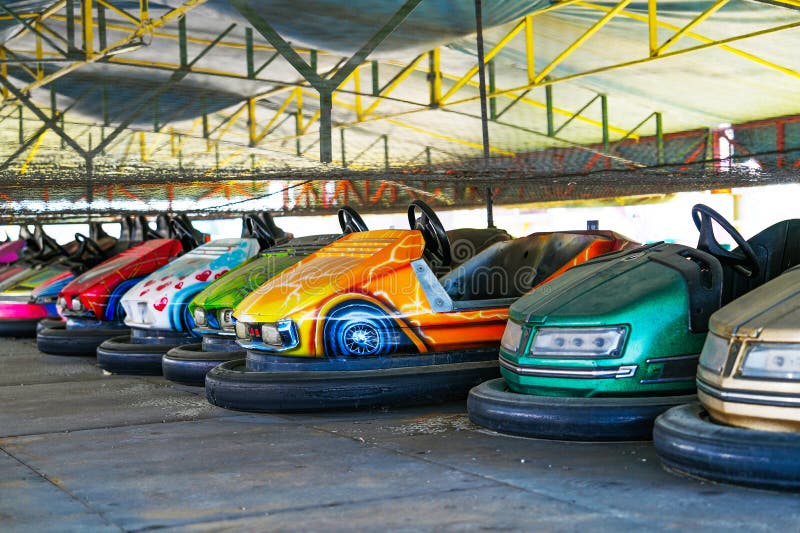 ARAD, ROMANIA, 12 APRIL, 2024: Colorful Bumper Cars in Amusement Park ...