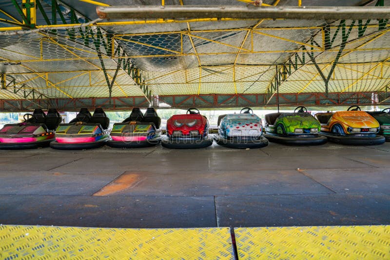 ARAD, ROMANIA, 12 APRIL, 2024: Colorful Bumper Cars in Amusement Park ...