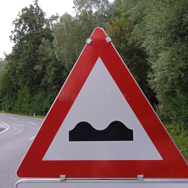 Bumps and Ground Waves Ahead Traffic Sign Stock Photo - Image of ...