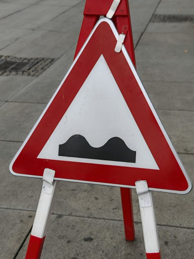 Bumps and Ground Waves Ahead Traffic Sign Stock Photo - Image of ...