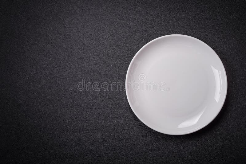 Bumpy Empty Ceramic Plate on a Textured Concrete Background Stock Image ...