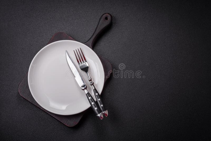Bumpy Empty Ceramic Plate on a Textured Concrete Background Stock Photo ...