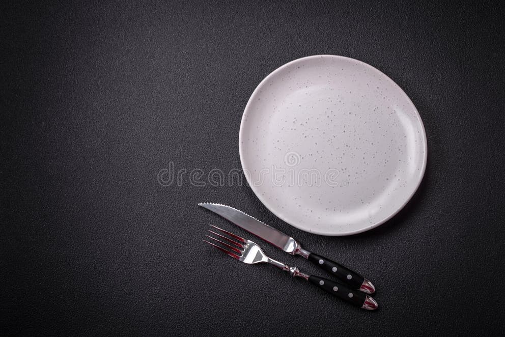 Bumpy Empty Ceramic Plate on a Textured Concrete Background Stock Image ...