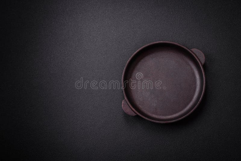 Bumpy Empty Ceramic Plate on a Textured Concrete Background Stock Image ...
