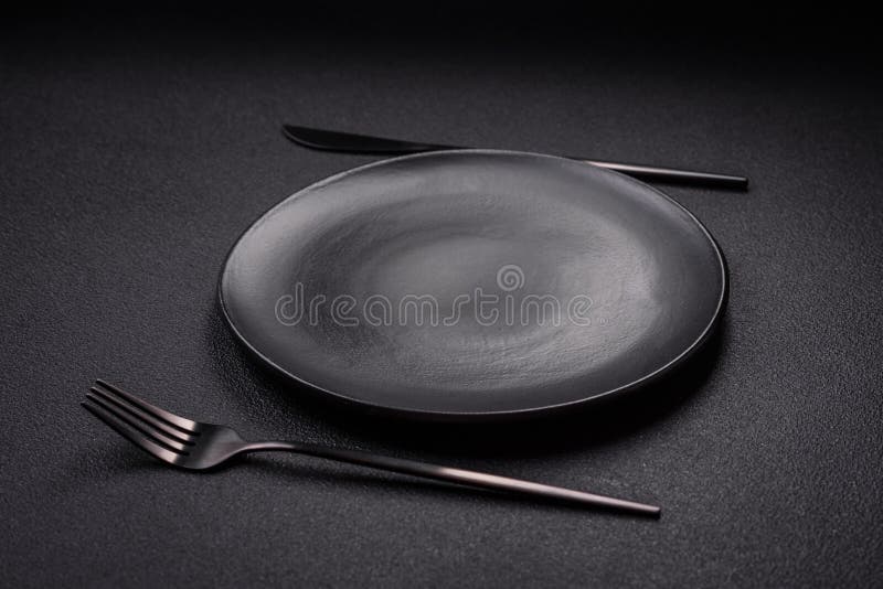 Bumpy Empty Ceramic Plate on a Textured Concrete Background Stock Photo ...