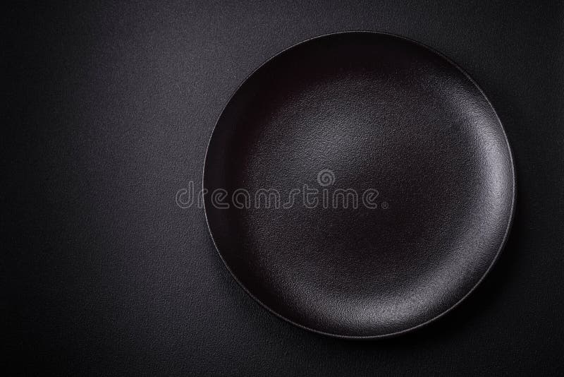 Bumpy Empty Ceramic Plate on a Textured Concrete Background Stock Image ...