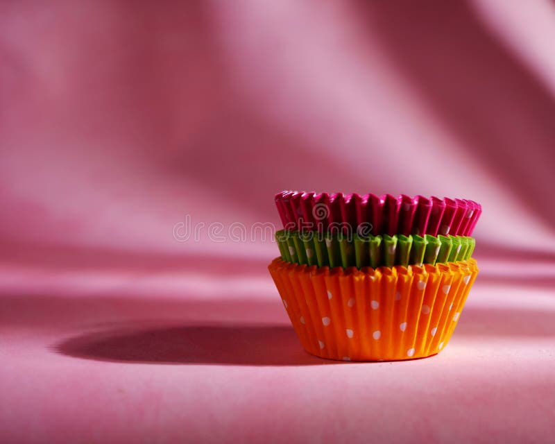 Bun Cases in Different Colors for Baking on Pink Background Stock Image ...