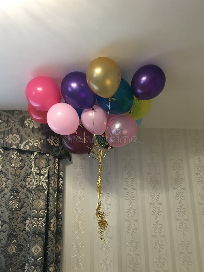 A Bunch of Balloons on a String Stock Image - Image of home, purple ...