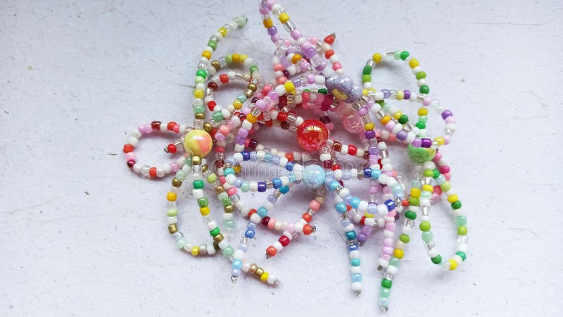 A Bunch of Beads are on a Table and Handmade Ribbon from Bead Stock ...