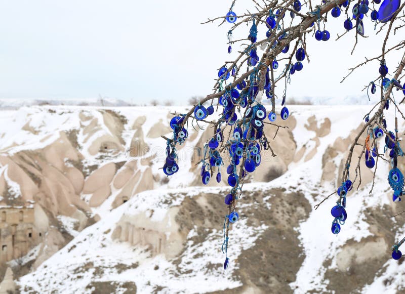 Blue Evil Eyes Hanging on Tree in Cappadocia, Turkey Stock Photo ...