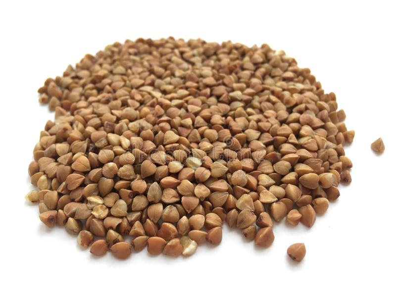 A Bunch of Buckwheat Kernels on a White Background Close. Stock Photo ...