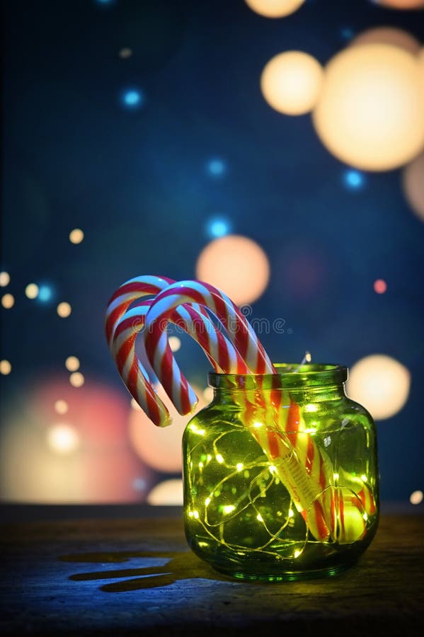 Bunch of Candy Canes and Led Light Strips in Old Jar Stock Photo ...